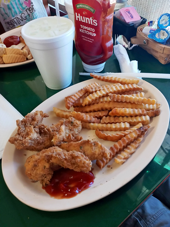 Chicken tenders and crinkle-cut fries&mdash;proof that sometimes the simplest pleasures are the most satisfying. Pass the ketchup, please!
