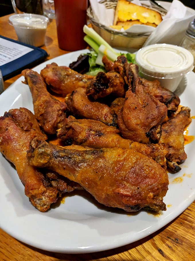 These aren't just wings; they're a masterclass in crispiness that would make even the most stoic football fan shed a tear of joy.