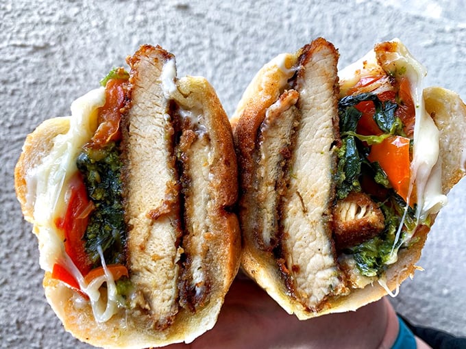 The chicken cutlet sandwich with broccoli rabe &ndash; where crispy meets bitter in a dance that your taste buds won't soon forget.