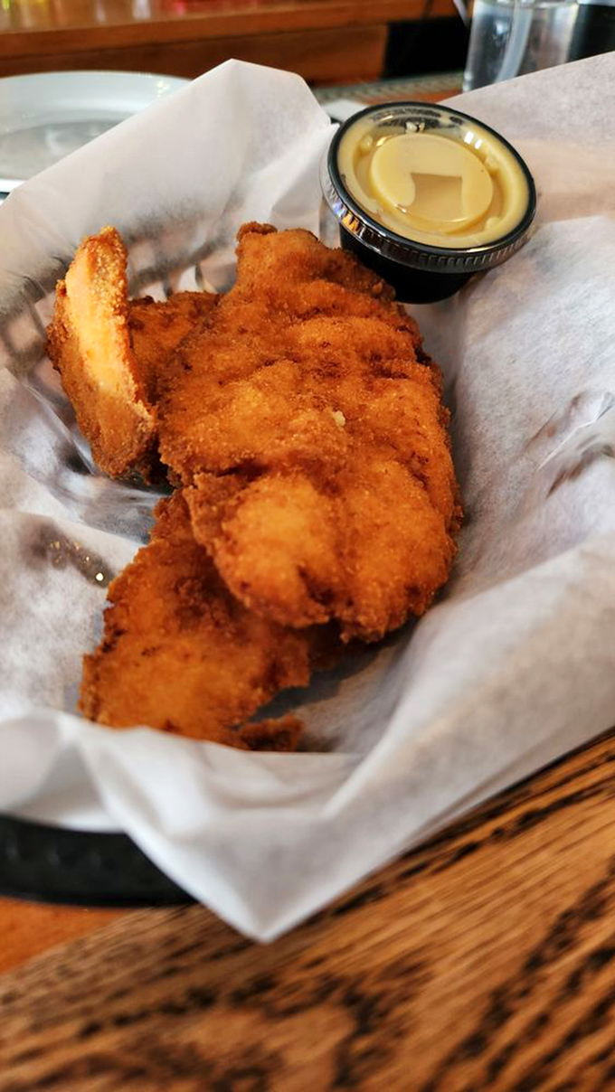 Golden-brown chicken fingers that prove sometimes the simplest foods, when done right, can outshine the fanciest culinary creations.