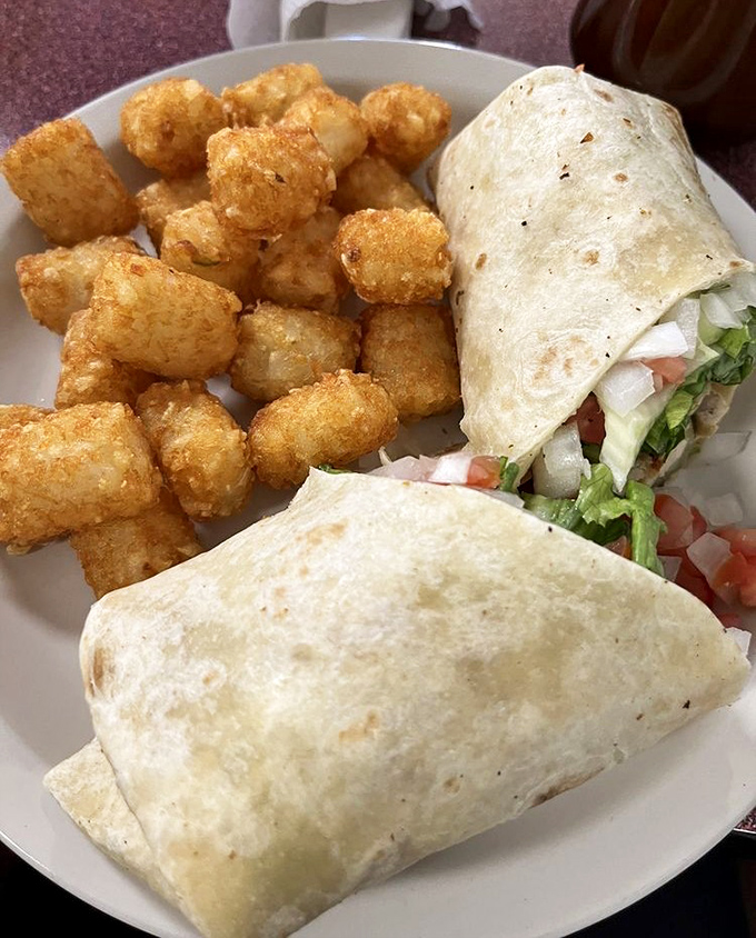 These wraps with crispy tater tots aren't trying to win beauty contests; they're too busy winning hearts and satisfying hunger.