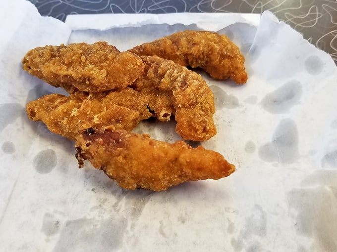 Golden-fried chicken tenders that crunch like autumn leaves. Simple food done right never goes out of style, especially when dipped in sauce.
