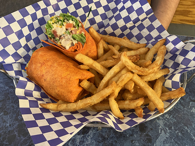 Fresh ingredients wrapped in a warm tortilla with crispy fries on the side&mdash;proof that even Mayberry knows how to do casual modern classics right.