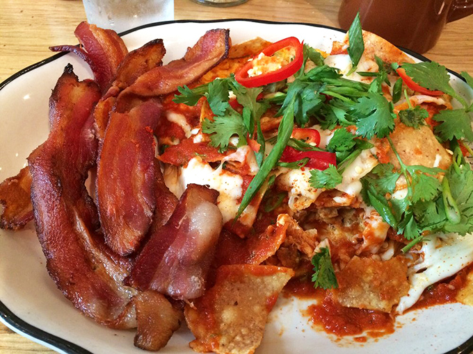Chilaquiles and bacon &ndash; the breakfast power couple that proves some relationships are worth the calories, especially when cilantro plays matchmaker.