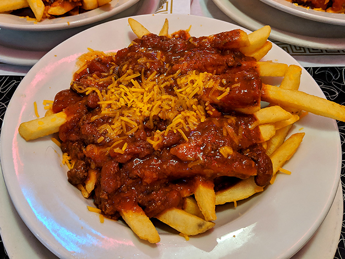 Chili cheese fries: where comfort food goes to show off. A mountain of golden fries buried under an avalanche of homemade chili and melted cheese.
