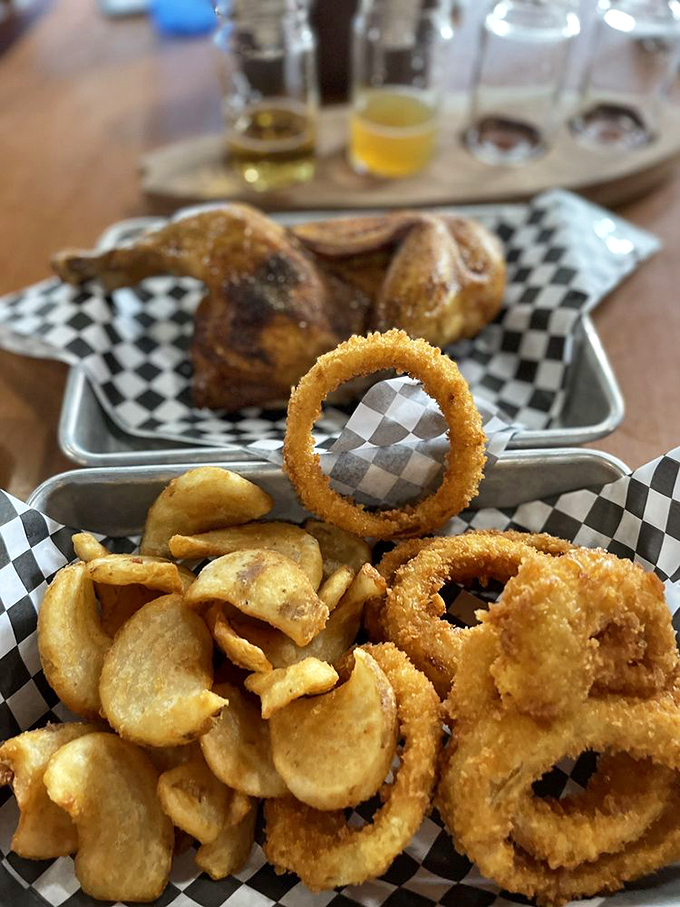Crispy onion rings and house-made chips that deserve their own spotlight. These aren't mere sides &ndash; they're supporting actors stealing scenes.