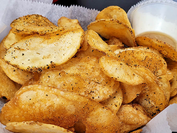 These aren't just chips—they're crispy discs of potato perfection. Seasoned with enough spice to make your taste buds do a happy dance.