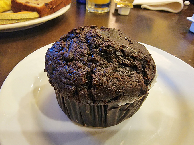 This chocolate muffin isn't just big &ndash; it's the size that makes other muffins feel inadequate. Dense, rich, and unapologetically decadent.