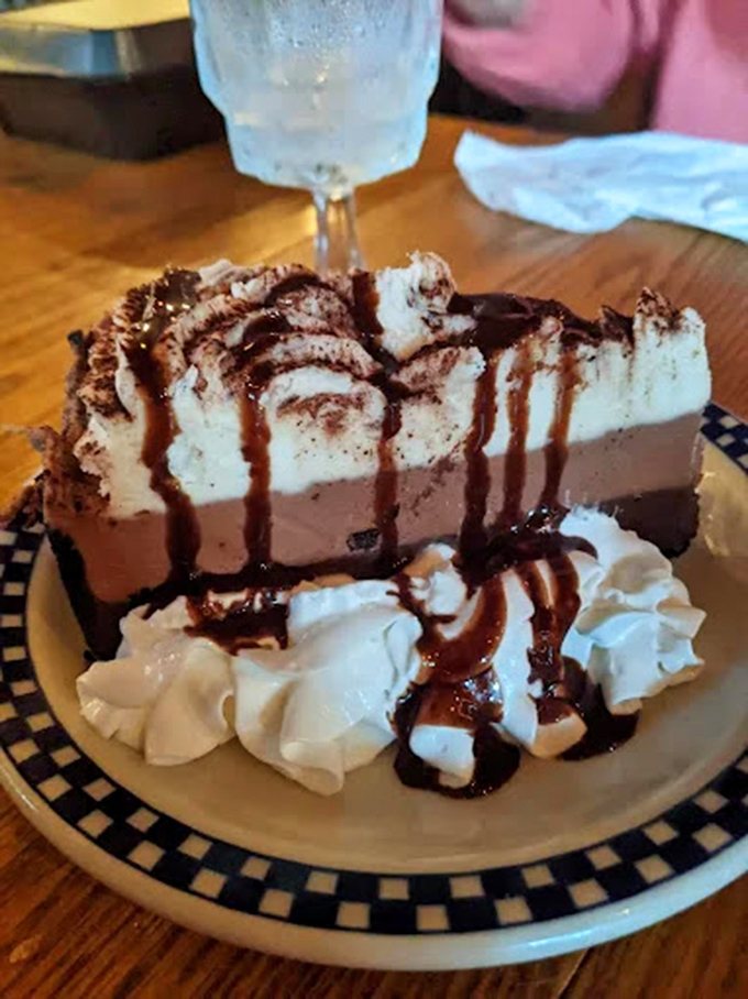 A chocolate dessert so decadent it should require signing a waiver. That whipped cream isn't decoration&mdash;it's necessary emotional support.