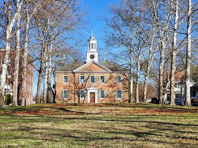 The Chowan County Courthouse commands attention with its stately brick facade and white clock tower &ndash; a testament to Georgian architecture in America's colonial heartland.