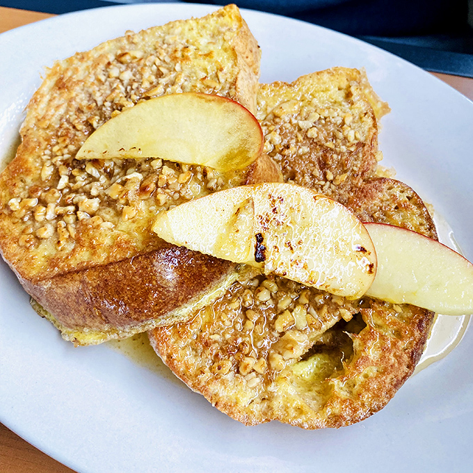 French toast that makes you question why you'd ever eat anything else for breakfast. Those apple slices aren't garnish&mdash;they're essential co-stars in this morning masterpiece.