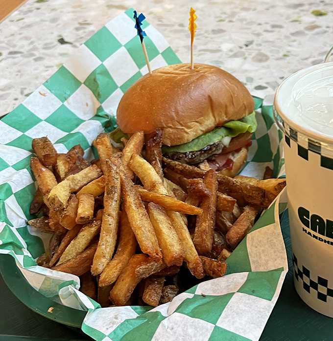 The classic burger and fries combo&mdash;proof that sometimes the simplest pleasures are the most profound. Those fries look like they're auditioning for food stardom.