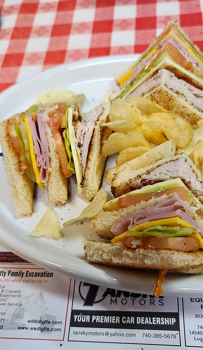 The club sandwich &ndash; that architectural marvel of toast, meat, and veggies that proves triangles really do taste better than squares.