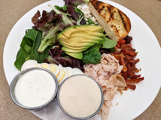 This Cobb salad isn't just lunch &ndash; it's a colorful landscape of flavors where avocado, bacon, and turkey coexist in perfect harmony.