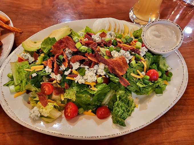 A salad that meat-lovers won't mock you for ordering. Those bacon bits aren't apologizing for turning a healthy choice into something decadent.