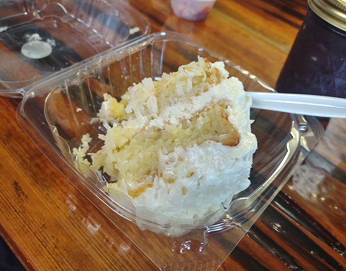 Coconut cake so light it practically hovers above its container, with layers that tell stories of Southern baking wisdom passed through generations.