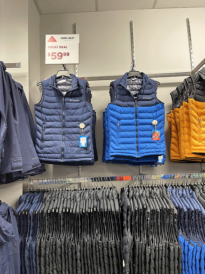 Columbia's famous Omni-Heat vests hanging like trophies. When Ohio winter strikes, these will be worth their weight in gold—but cost significantly less.