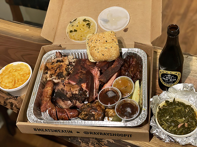 Not so much a meal as a barbecue festival on a tray. The collard greens hiding in the corner are the unsung heroes of this meat symphony.