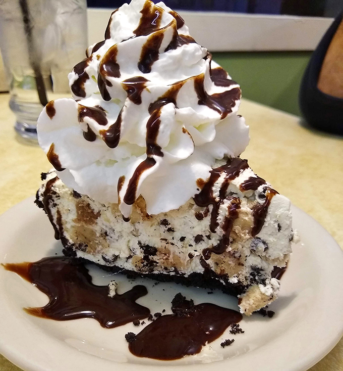 This cookies and cream pie with its mountain of whipped cream isn't just dessert &ndash; it's therapy you can eat with a fork.