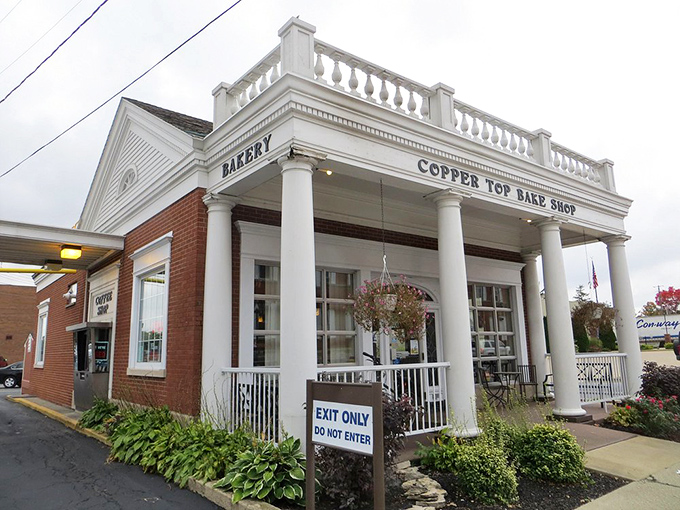 The Copper Top Bake Shop's stately columns aren't just architectural flourishes&mdash;they're sentinels guarding the gateway to carbohydrate heaven.