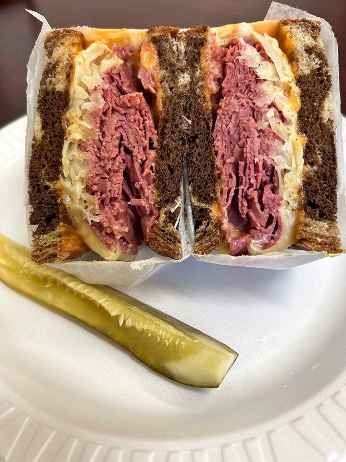 The corned beef Reuben isn't just a sandwich&mdash;it's architecture, with layers of pink meat, sauerkraut, and melted cheese creating a skyscraper of flavor.