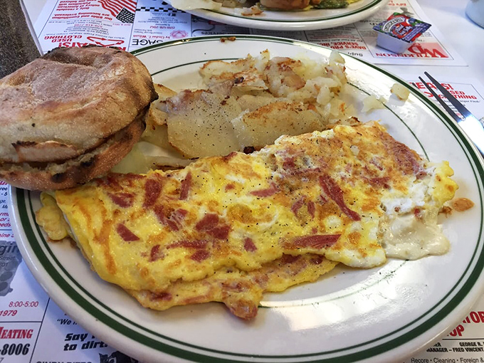 This omelet has more fillings than your average tax return, paired with home fries that crackle with each bite.