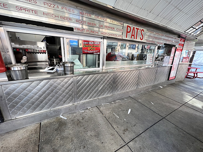 The ordering window&mdash;where dreams come true and tourists learn the hard way that "I'll have a cheesesteak" isn't specific enough.