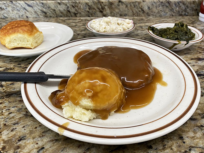 Country fried steak smothered in gravy isn't just a meal&mdash;it's a Southern tradition that demands respect, a knife, and possibly an afternoon nap.