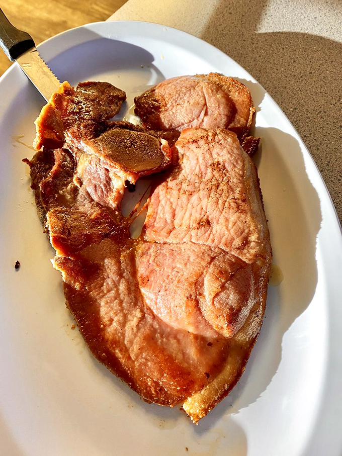 Country ham that's lived a full life of flavor. This isn't some paper-thin deli slice&mdash;it's a proper slab of porcine pleasure.