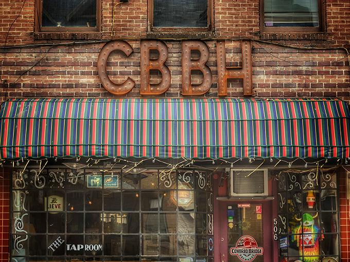 The CBBH Taproom's vintage sign promises what retirement should: good drinks, better conversation, and no urgent emails to answer.