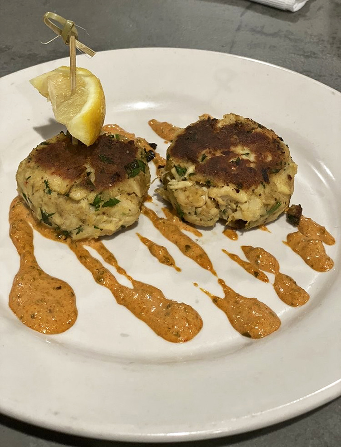 Crab cakes that are actually crab, not breadcrumbs with a seafood rumor. That remoulade sauce deserves its own fan club.