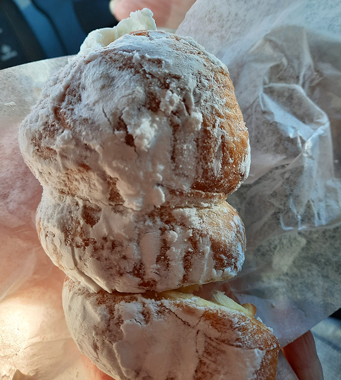 A donut artist's handiwork on display &ndash; each powdered creation looking like it belongs in the Louvre of breakfast pastries.