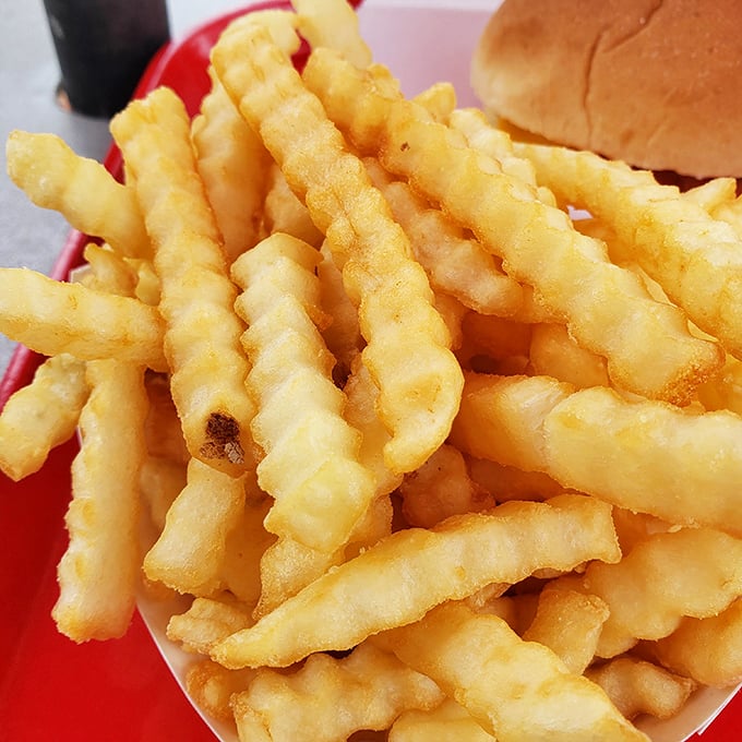 Crinkle-cut fries that achieve the golden ratio of crispy exterior to fluffy interior&mdash;the supporting actors that sometimes steal the show from the sandwich stars.