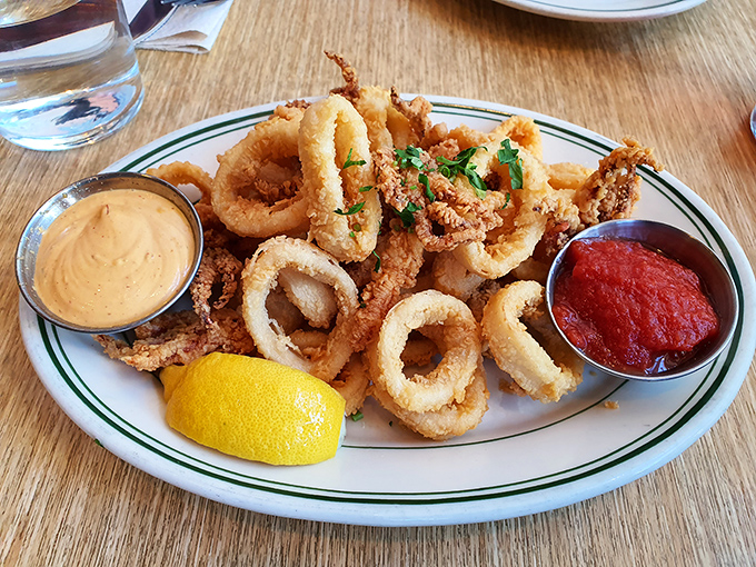 These calamari rings aren't those rubbery punishment circles from chain restaurants&mdash;they're tender morsels of oceanic delight with dipping sauces worth fighting over.
