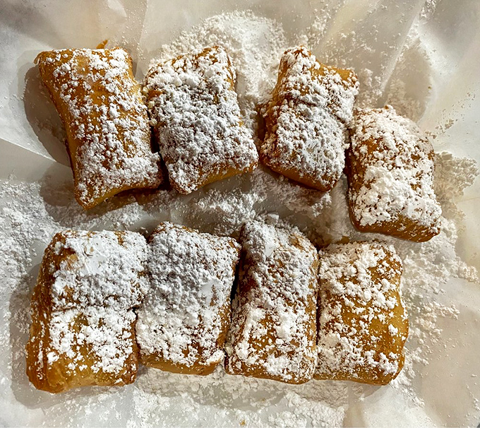 Powdered sugar-dusted beignets that would make New Orleans jealous &ndash; little pillows of fried dough that disappear faster than you can say "dessert."