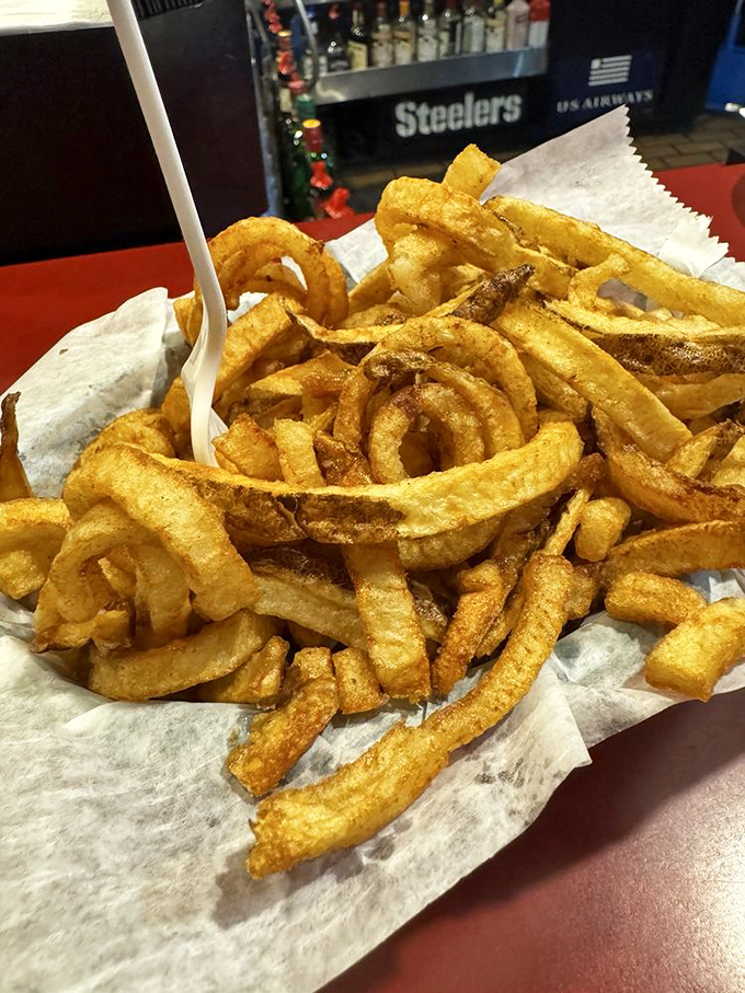 Curly fries: the fun-loving, spiralized cousins of regular fries that make you feel like you're eating something completely different. Spoiler alert: you're not.