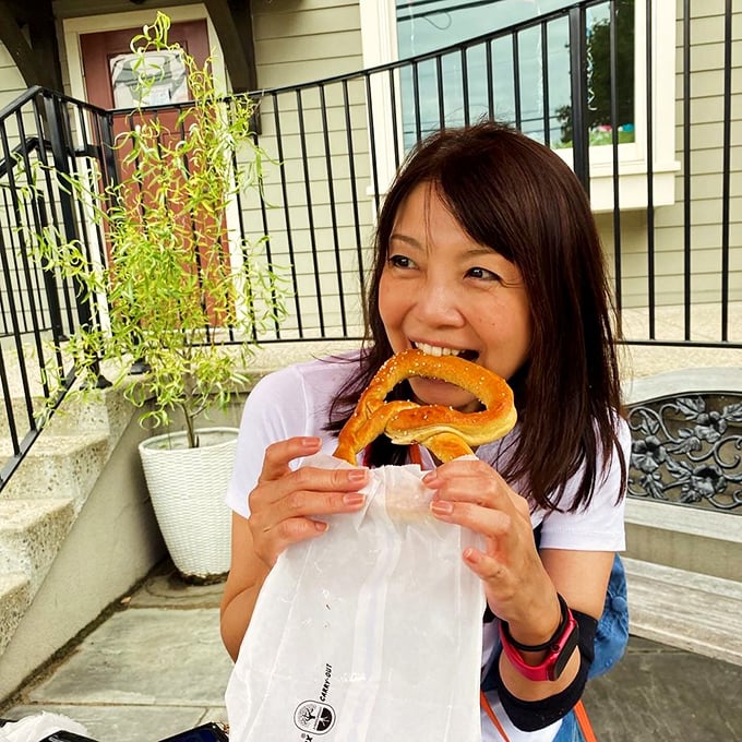 The universal expression of pretzel joy knows no cultural boundaries. That first bite face is the same in any language.