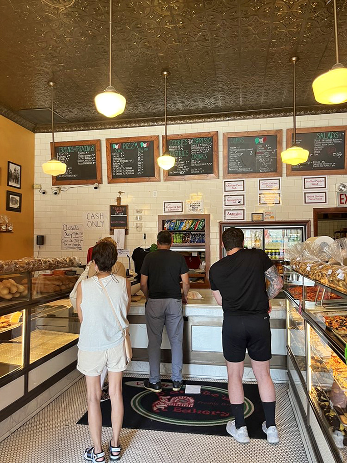 The line forms for good reason. Locals and visitors alike patiently wait their turn for a taste of Chicago's Italian bakery heritage.
