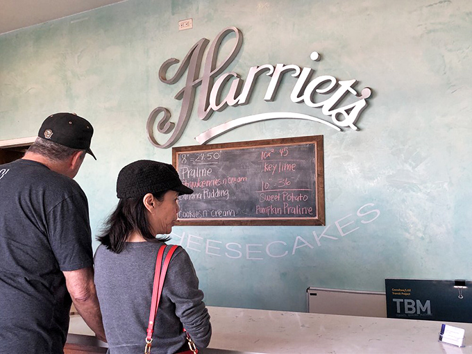 Customers contemplating their cheesecake choices with the seriousness such decisions deserve &ndash; life's big questions happen at this counter.