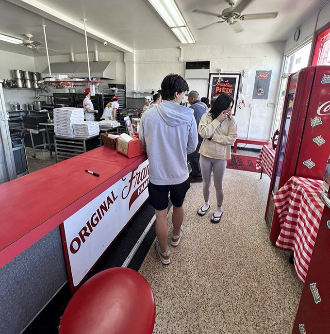 The line forms quickly at lunchtime &ndash; a diverse cross-section of Miami united by the universal language of exceptional square pizza.