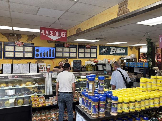 The lunch rush at T & F - where everyone's equal in the eyes of the sandwich gods.
