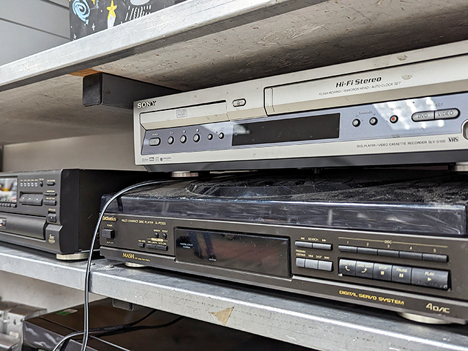 Vintage electronics stand at attention, these Sony and AIWA relics from the analog age still promising to play the soundtracks of yesteryear.