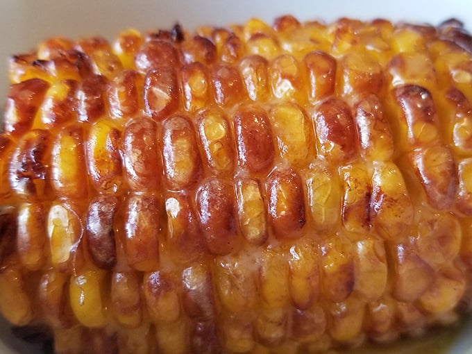 Corn on the cob transformed into caramelized perfection. Nature's candy made even better through the magic of butter and heat.