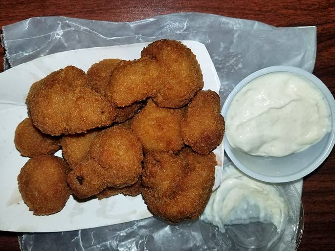 Golden-fried mushrooms that could convert even the most dedicated vegetable skeptic. Crispy outside, tender inside &ndash; nature's perfect snack design.