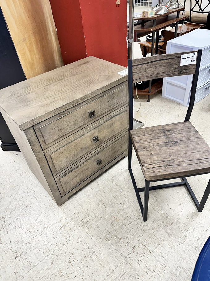 Modern meets rustic in this weathered wood dresser and chair combo&mdash;perfect for that "I decorated intentionally" farmhouse vibe.