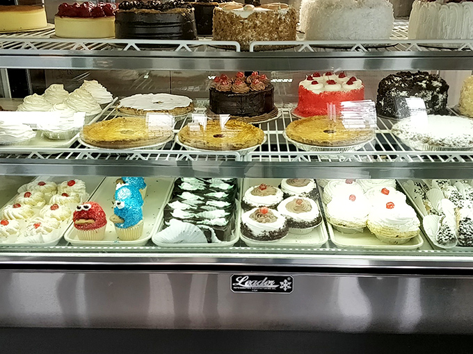 The dessert case that stops conversations mid-sentence and makes grown adults point like excited children.