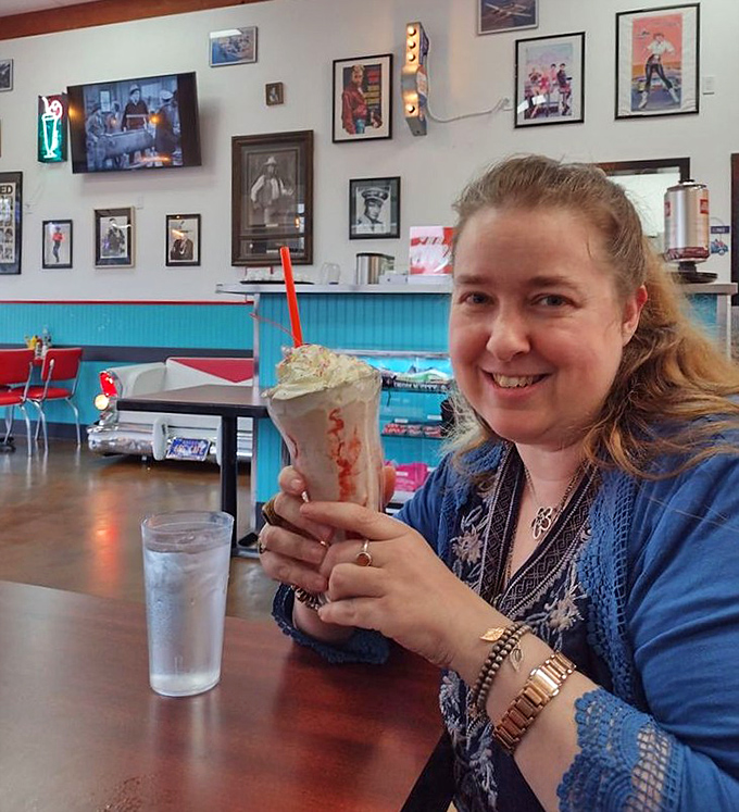 That smile says it all&mdash;milkshake happiness is a universal language that requires no translation, just a good straw.