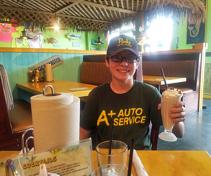 Family-friendly atmosphere where milkshakes and memories are made &ndash; the thatched ceiling adds that perfect beach shack charm.