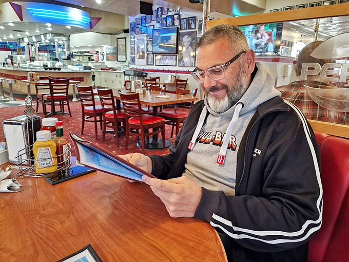 Every booth tells a story, every table an invitation. The diner's warm interior feels like a hug from a long-lost friend.