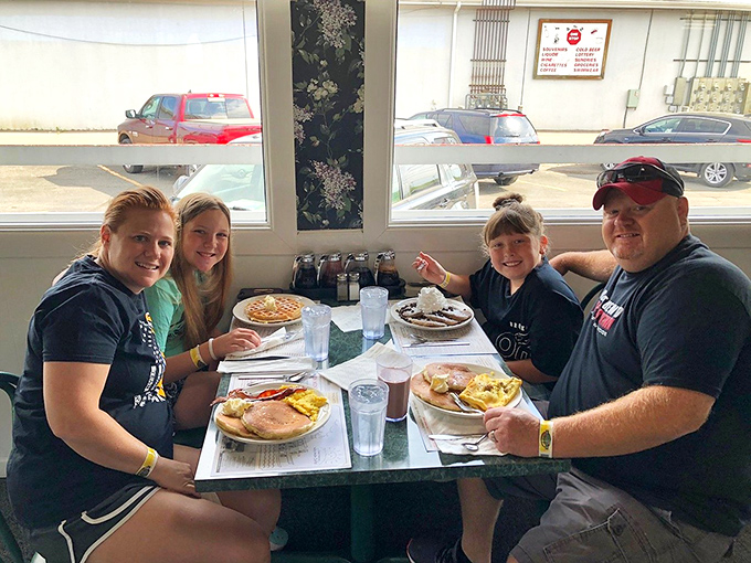 Happy families creating breakfast memories&mdash;the universal language of "please pass the syrup" transcends all differences.